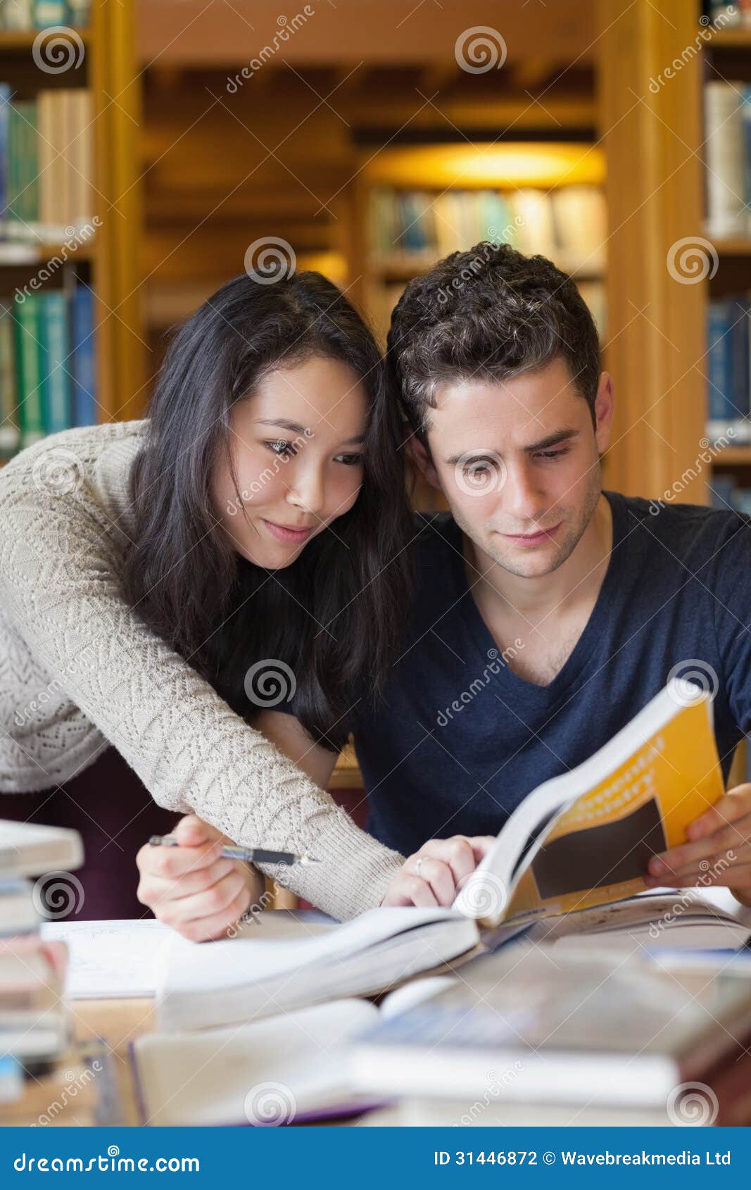 Two Students Studying in a Library Stock Photo - Image of making ...