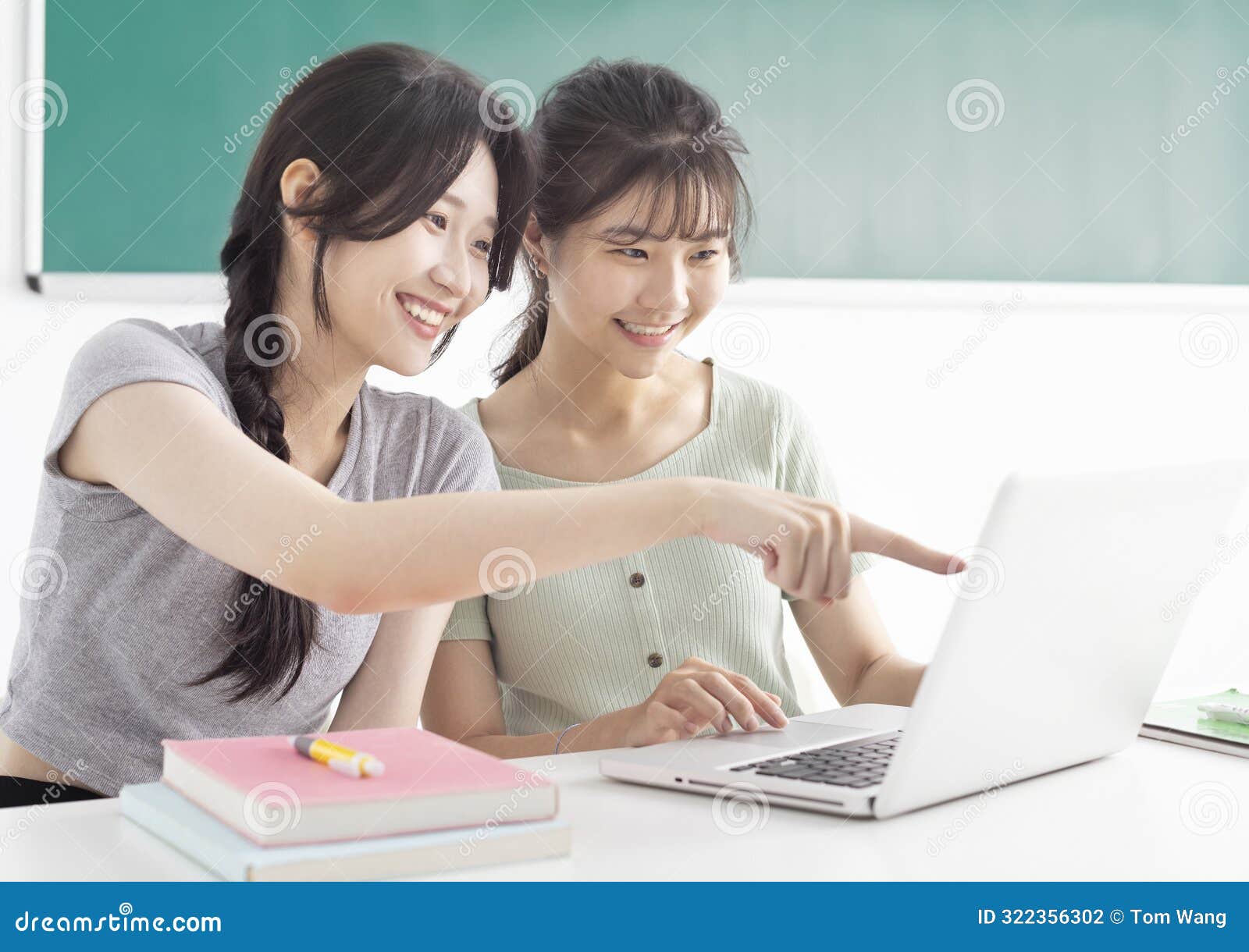 Two Students Studying Together and Watching the Laptop Stock Photo ...