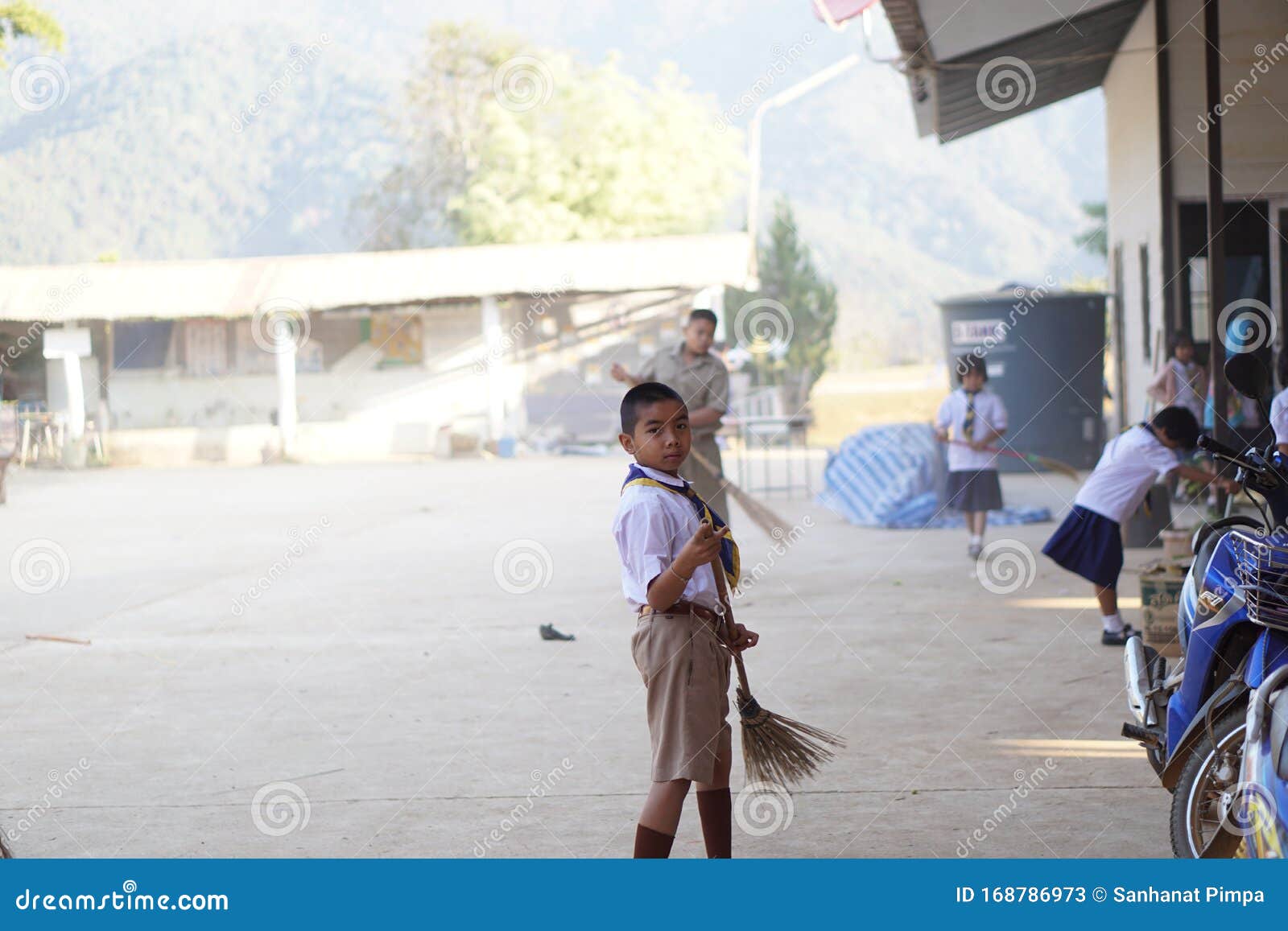 Sweep the courtyard editorial stock photo. Image of leaf - 168786973