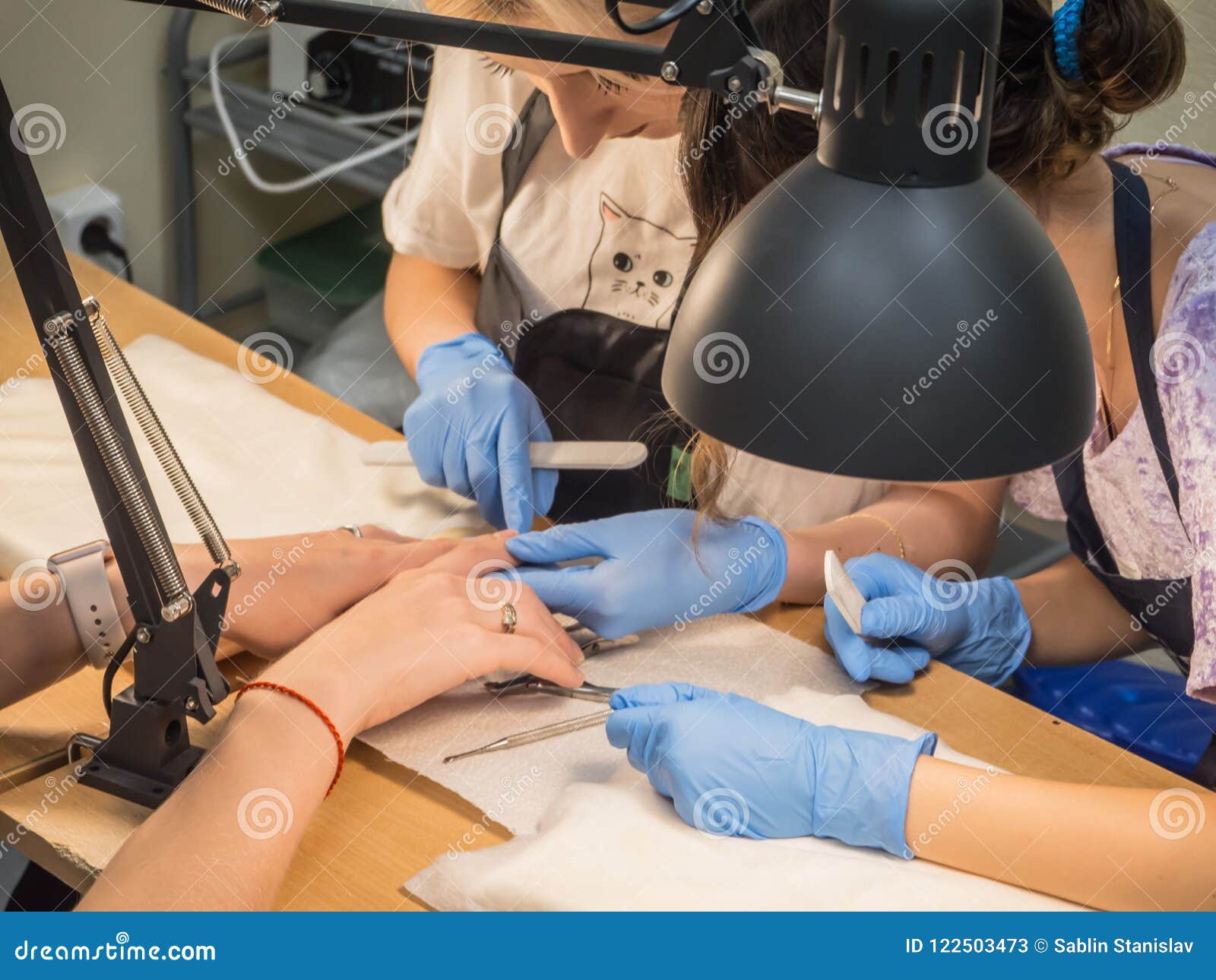 Two Students Work on a Manicure Client Training School Manicure. Russia ...