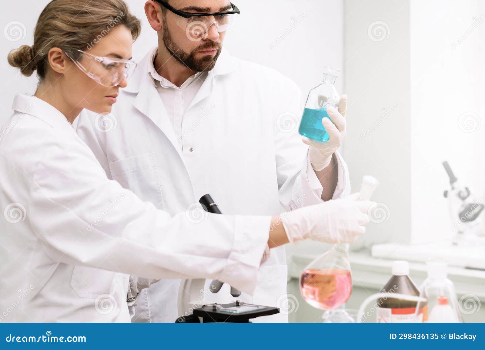 Two Students are Working in Laboratory during Science Research Work ...