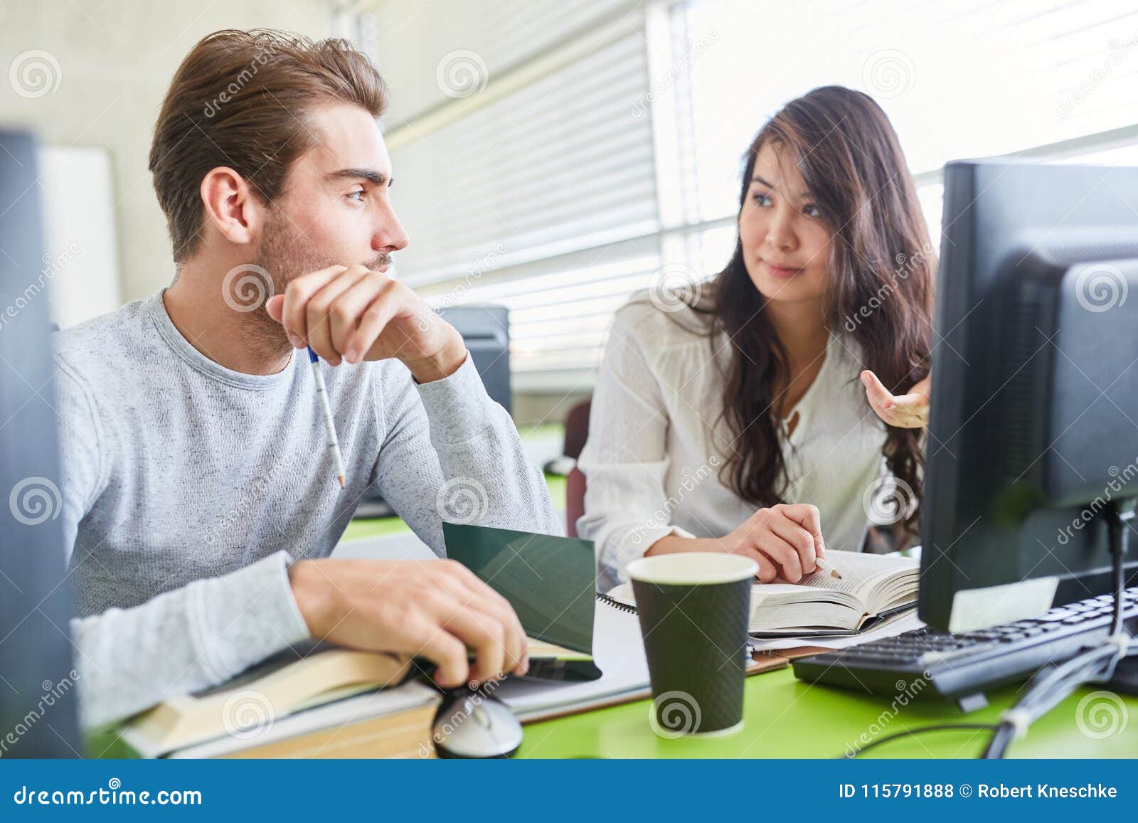 Two students in workshop stock photo. Image of class - 115791888