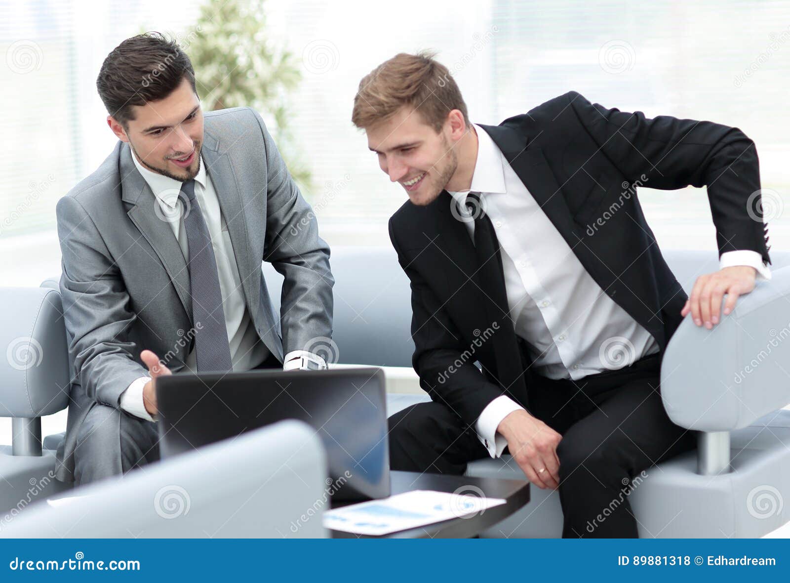 Two Successful Business Men Discussing Documents in a Modern Off Stock ...