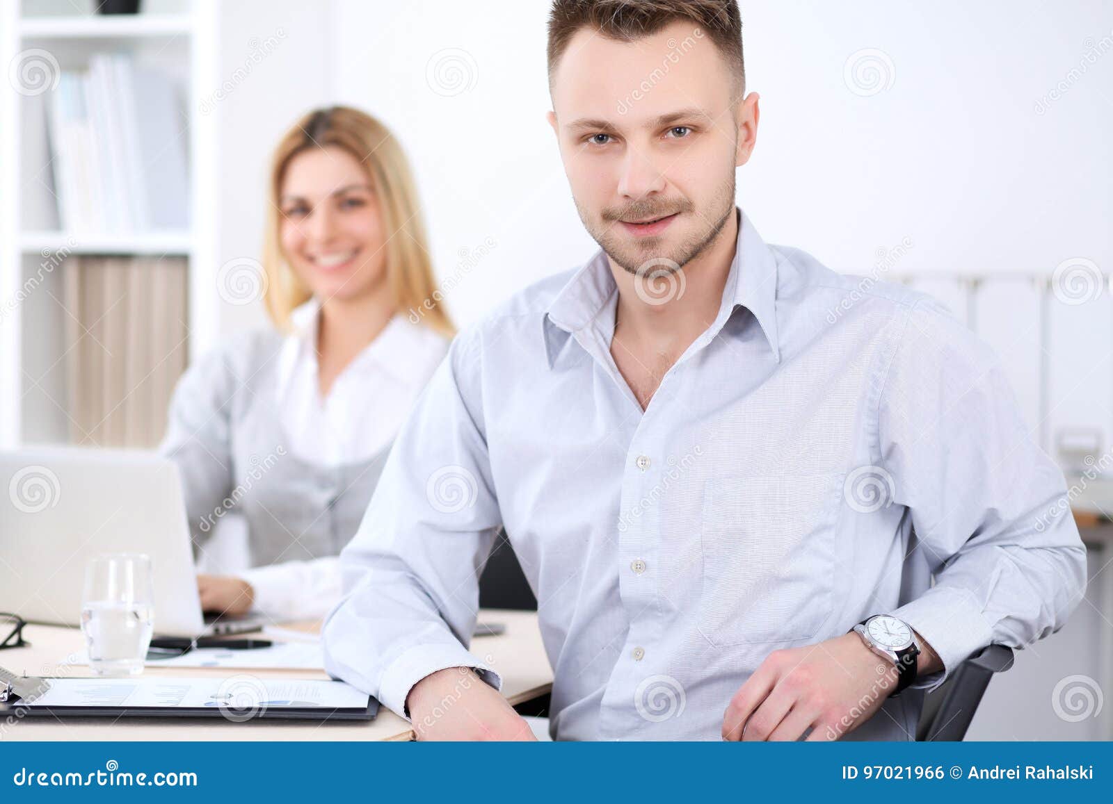 Two Successful Business Partners Working at Meeting in Office. Focus on ...