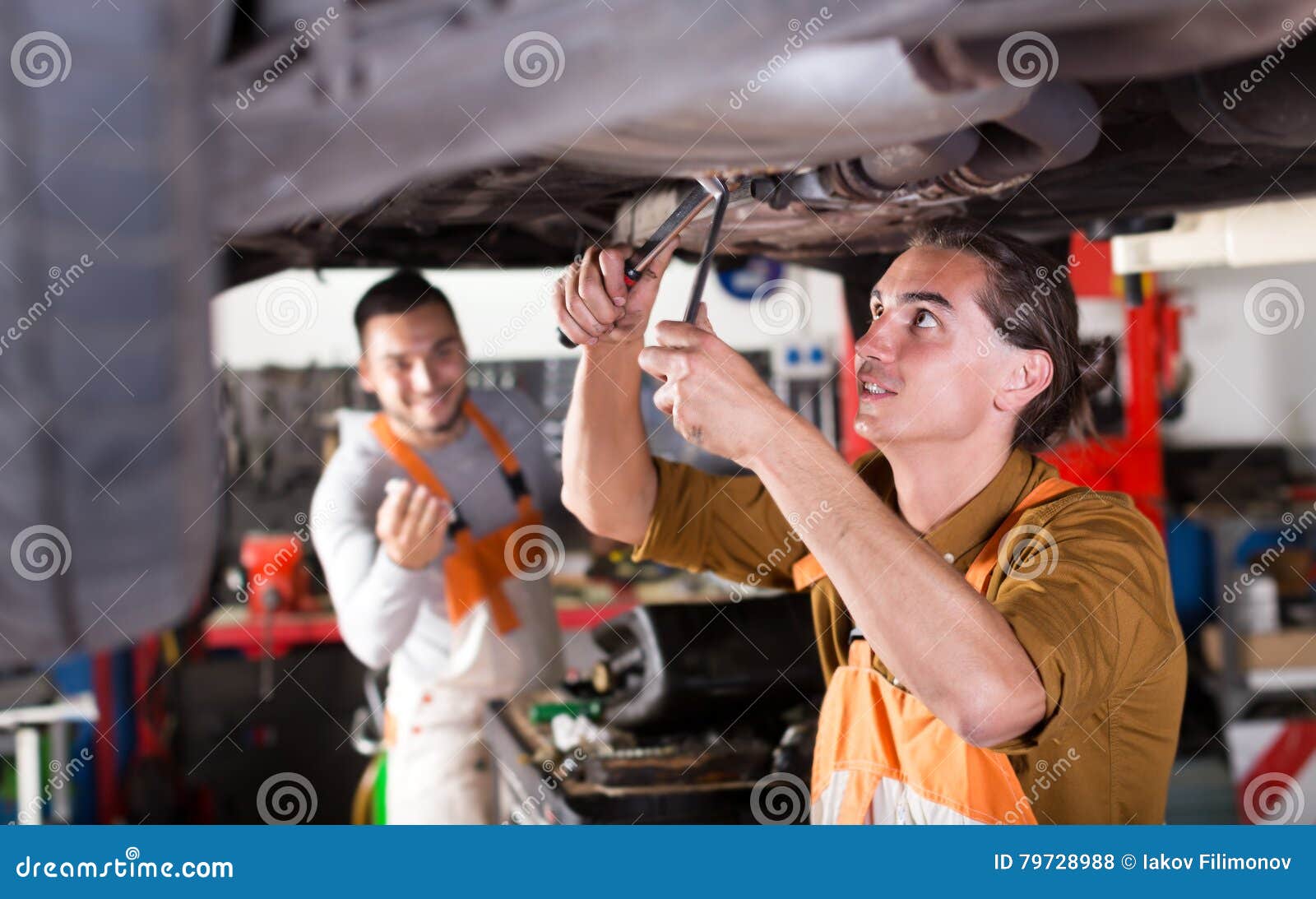 Two Successful Car Mechanics Stock Photo - Image of people, caucasian ...