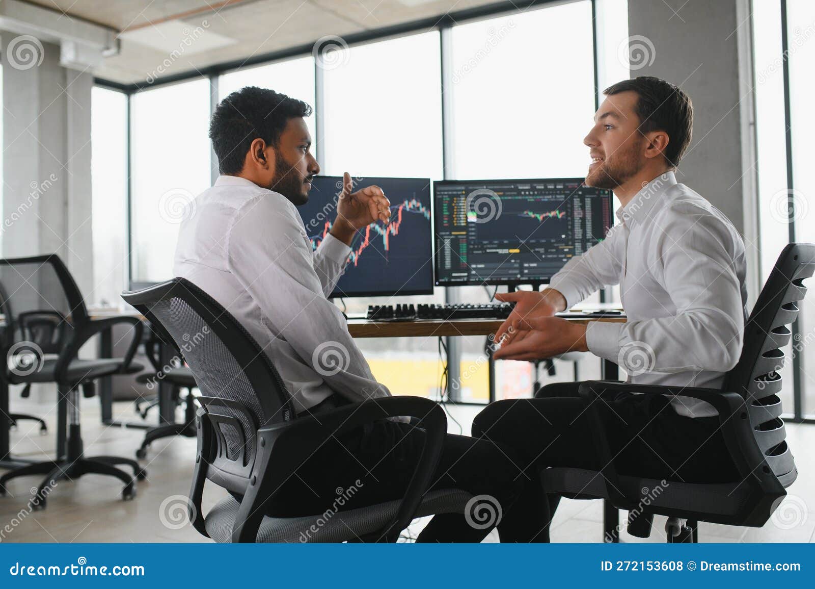 Two Successful Trader in Formalwear Pointing at Display, Analyzing Stat ...