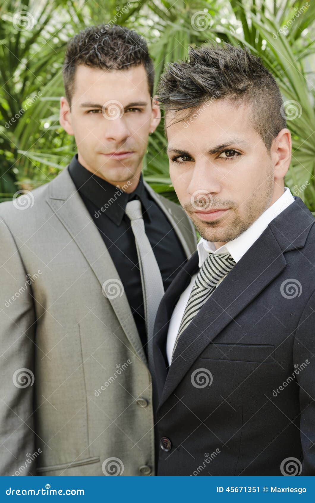 Two Suit Young Men Posing Looking at the View Stock Image - Image of ...