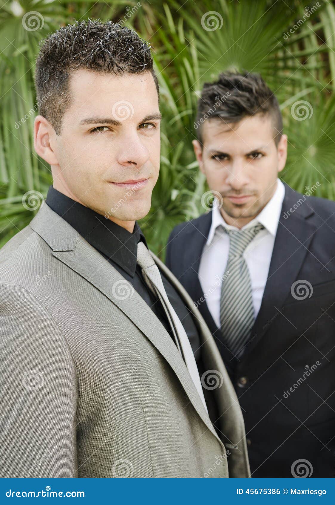 Two Suit Young Men Posing Looking at the View Stock Photo - Image of ...
