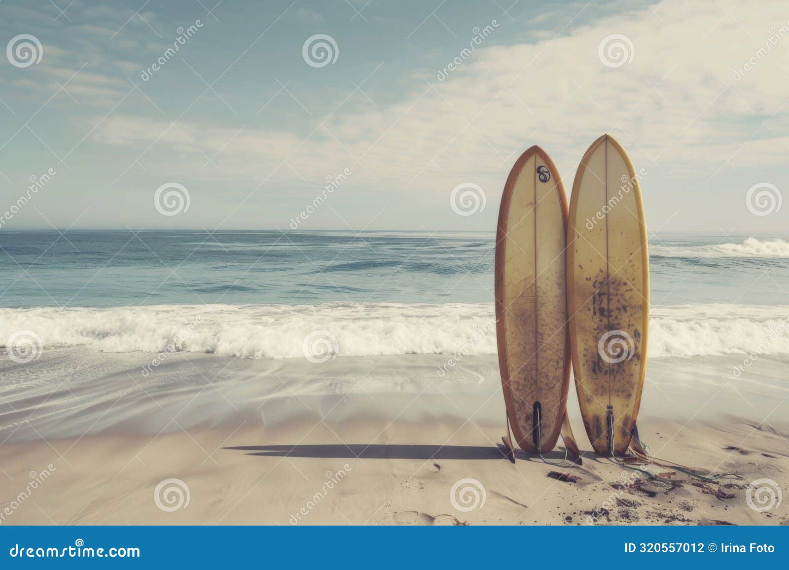 Two Surfboards Standing on a Sandy Beach by the Ocean. Stock Photo ...