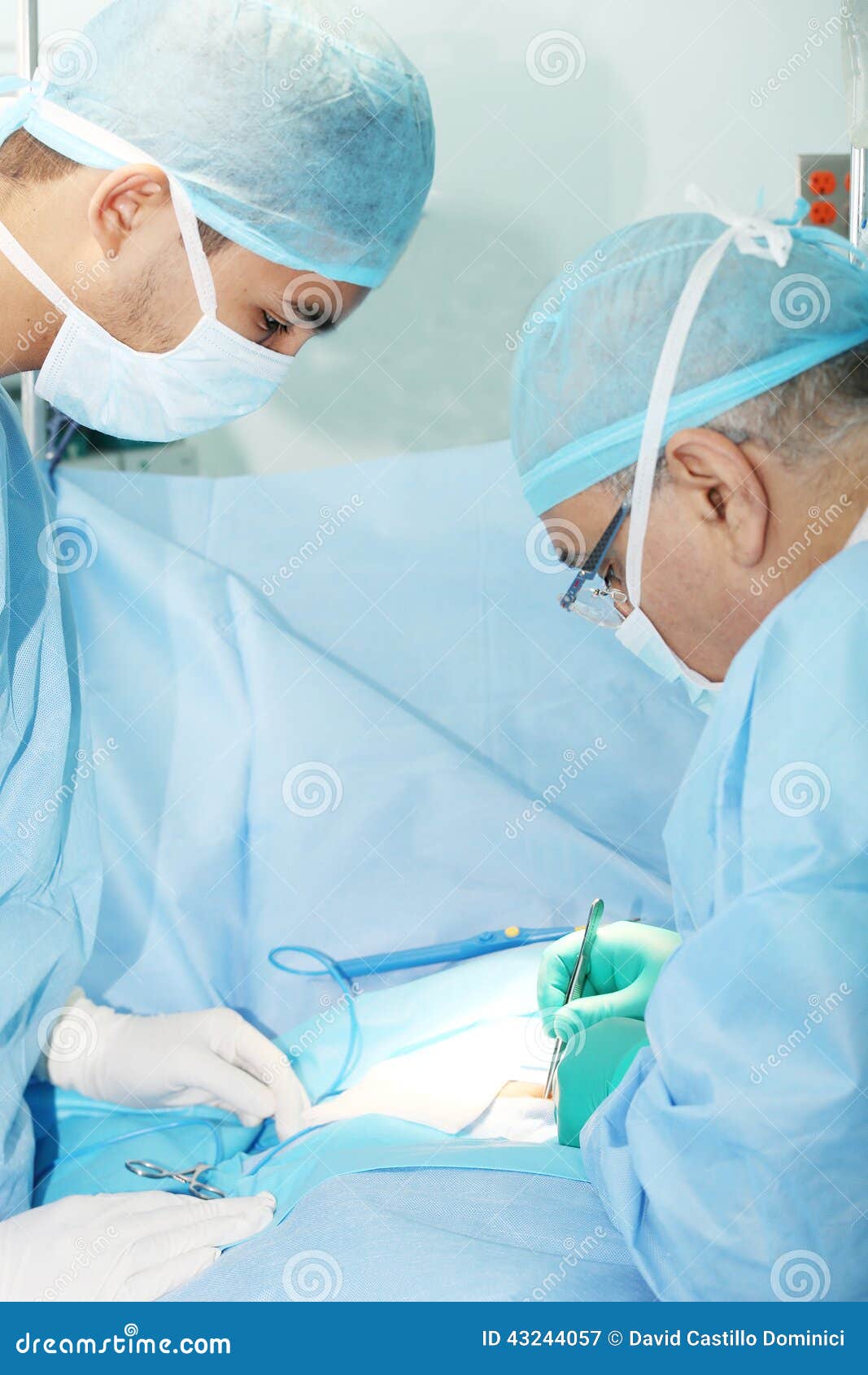 Two surgeons working stock image. Image of glasses, hospital - 43244057