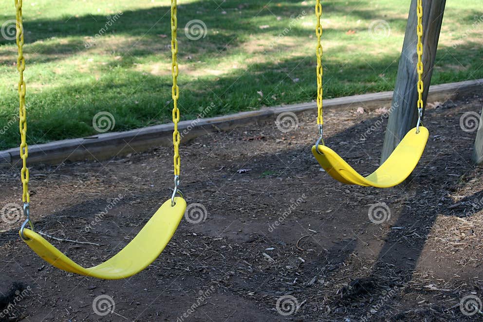Two swings stock photo. Image of green, chain, pair, grass - 66430902