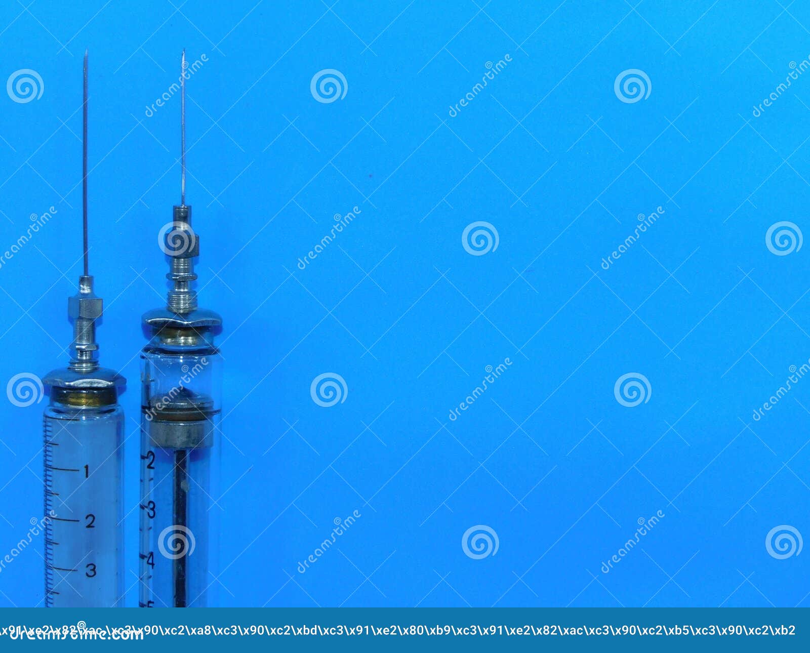 Two Syringes for Injections on a Blue Background Stock Image - Image of ...