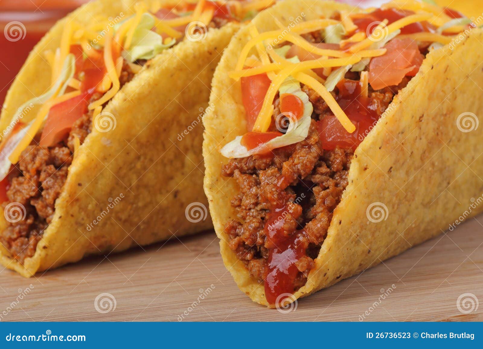 Two Beef Tacos With Cheese, Lettuce And Tomatoes Royalty-Free Stock ...