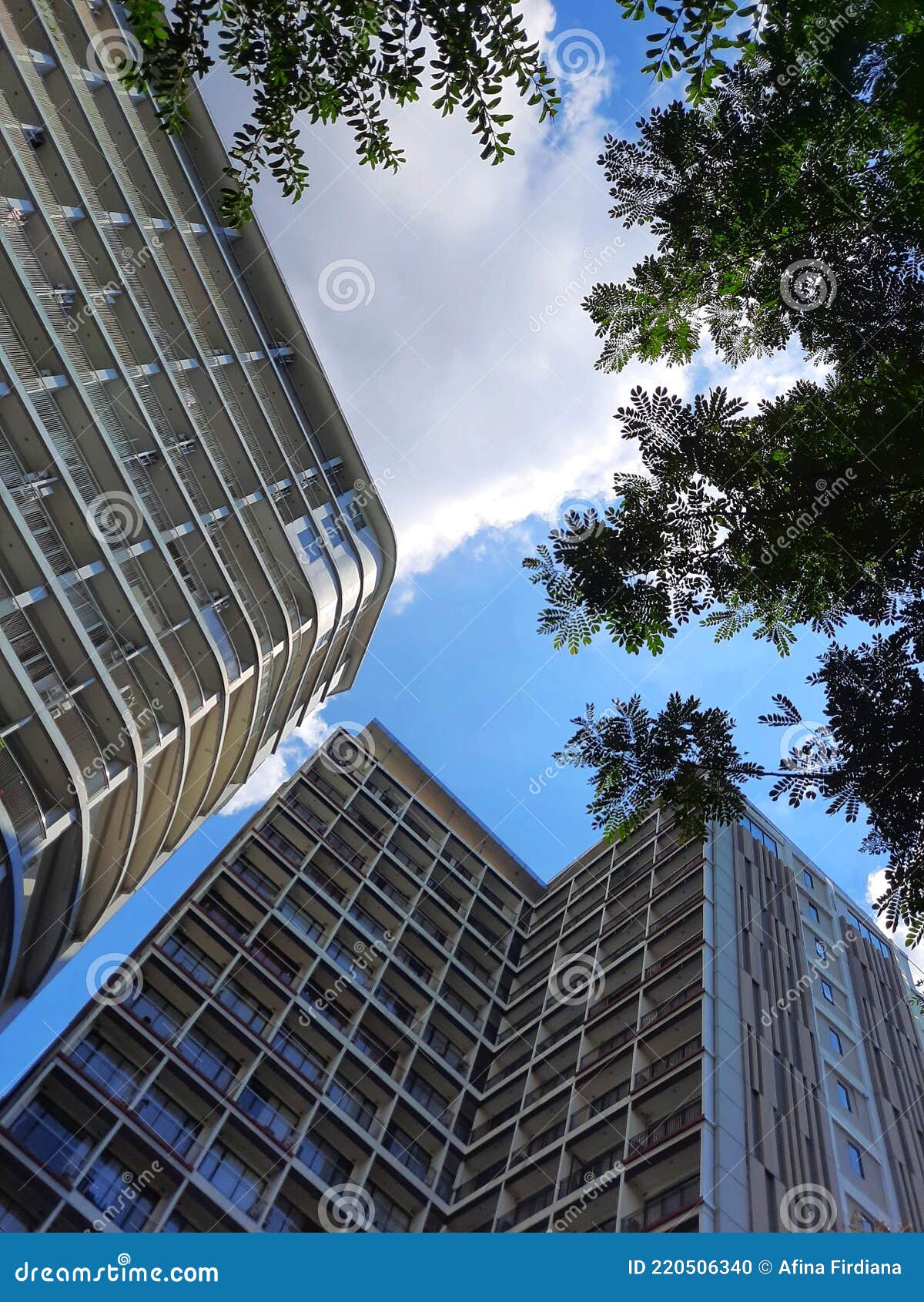 Two Tall Buildings Built Side by Side Stock Photo - Image of roof ...