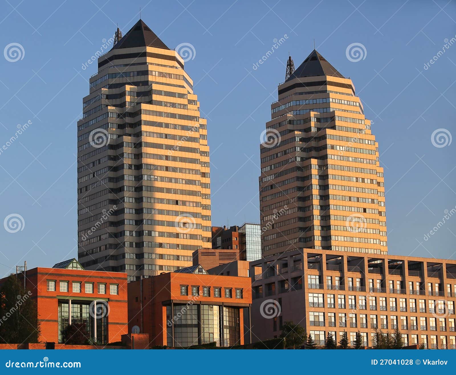 Two Tall Buildings at Sunset Stock Photo - Image of domicile ...