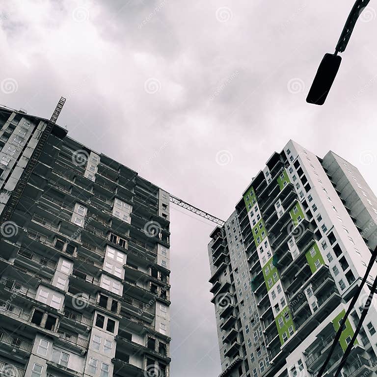 Two Tall Buildings that are Under Construction and Not yet Completed ...