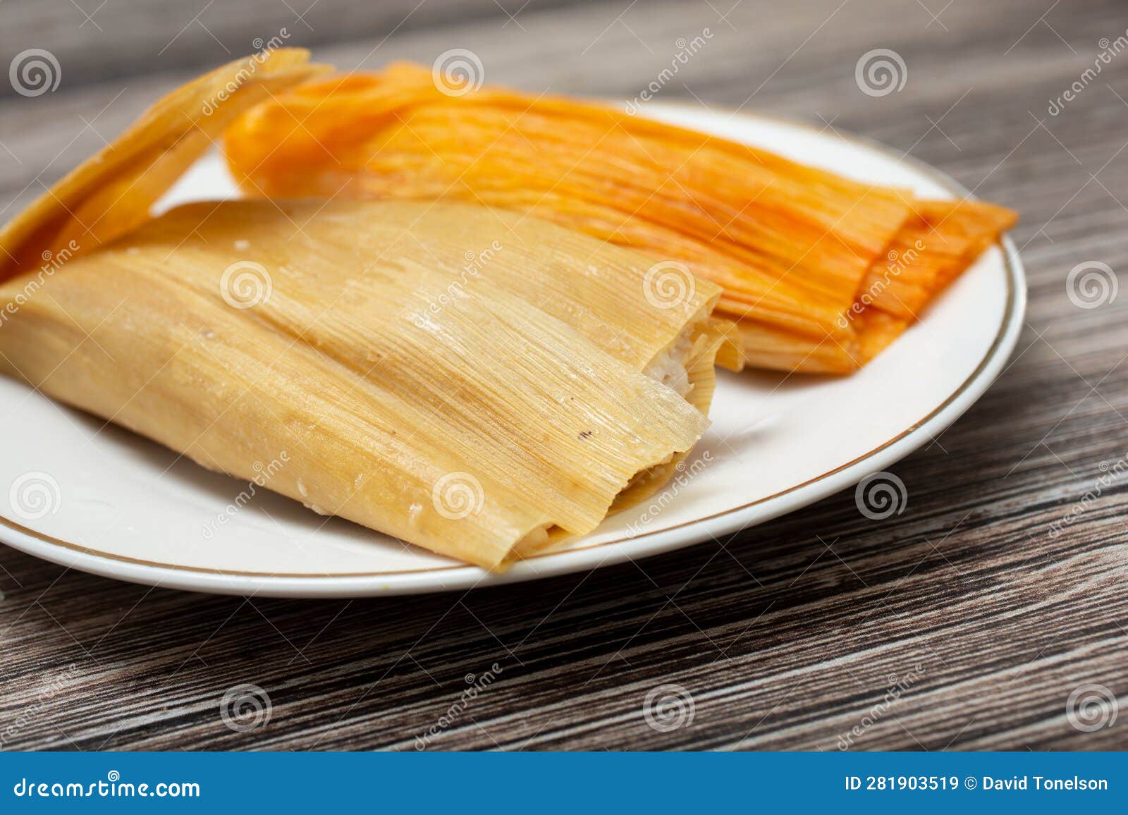 Two tamales and a plate stock image. Image of ingredient - 281903519