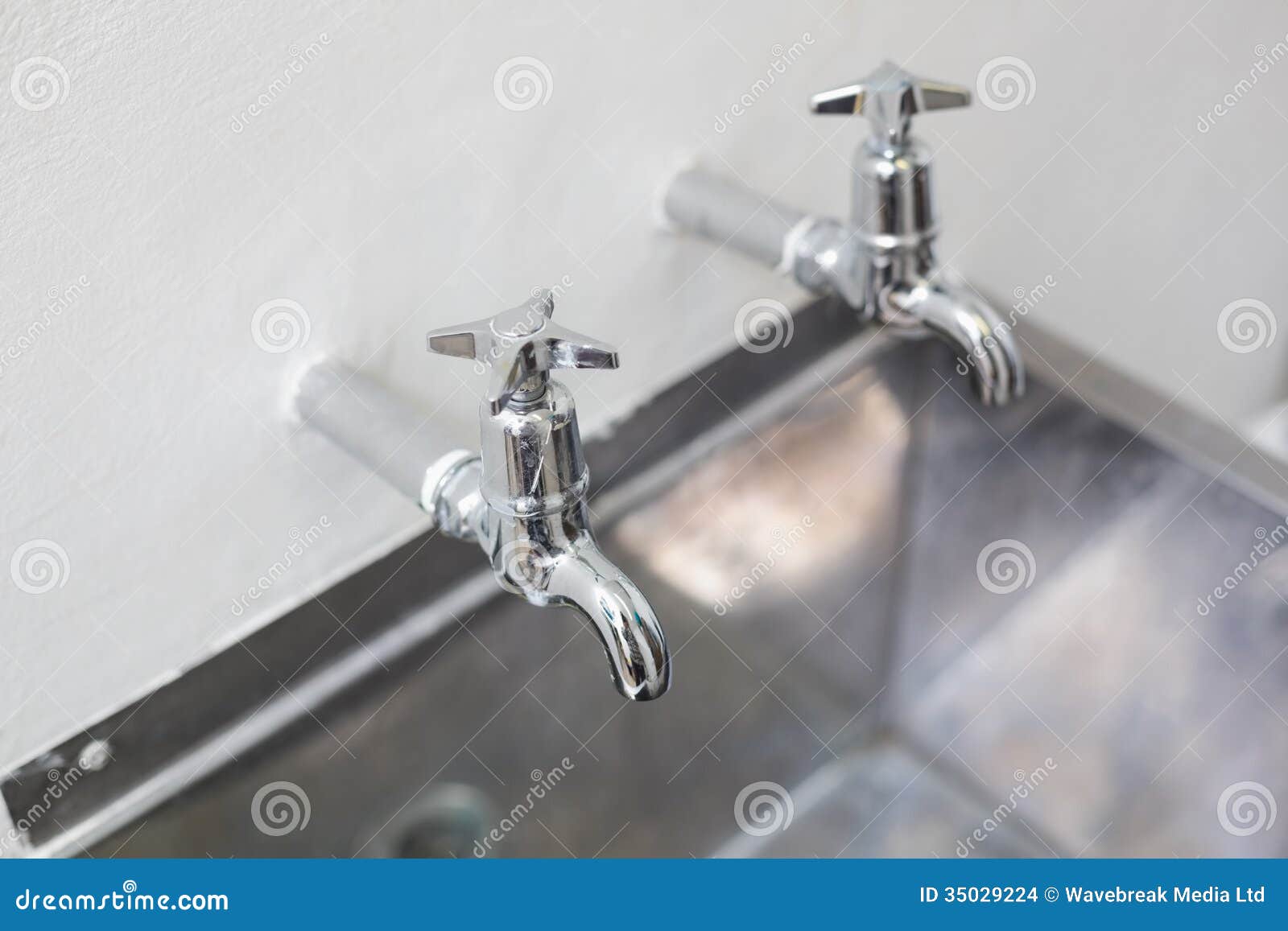 Two Taps and Stainless Steel Kitchen Sink Stock Photo - Image of ...