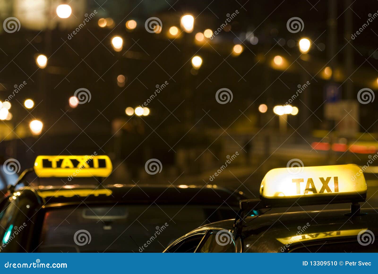 Two taxi signs at night stock photo. Image of taxicab - 13309510