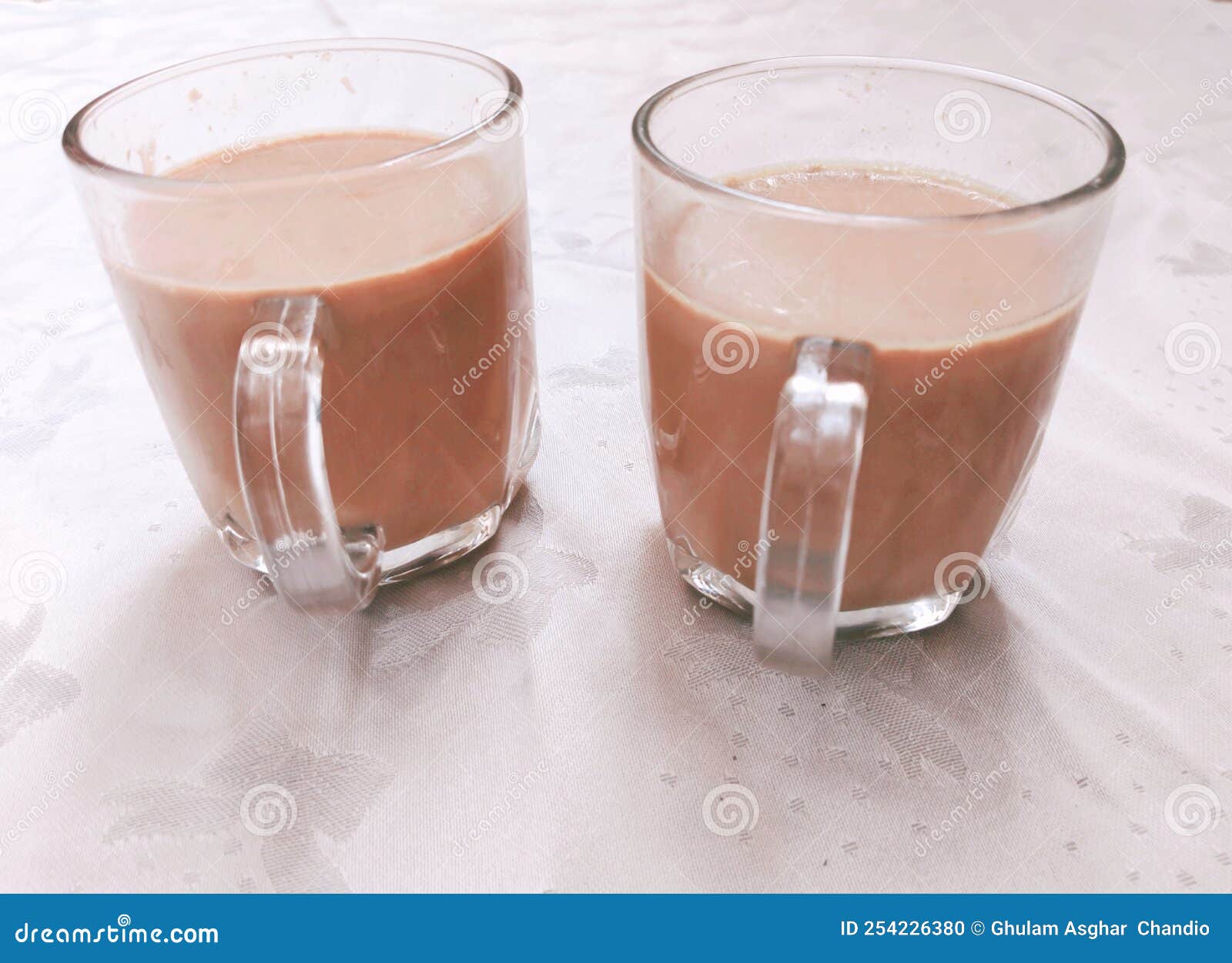 Two Tea Cups with Tea Filled in Them Stock Photo - Image of filled ...