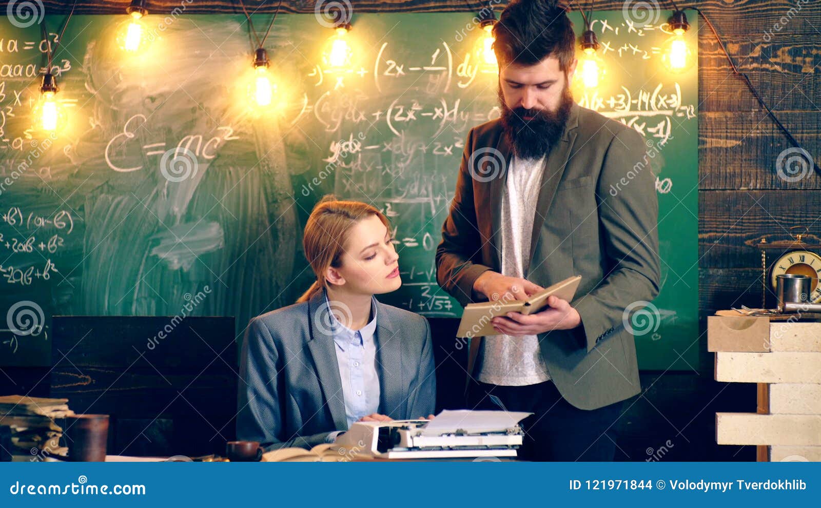 Two Teachers in the Class Type the Text on the Typewriter. Learning ...