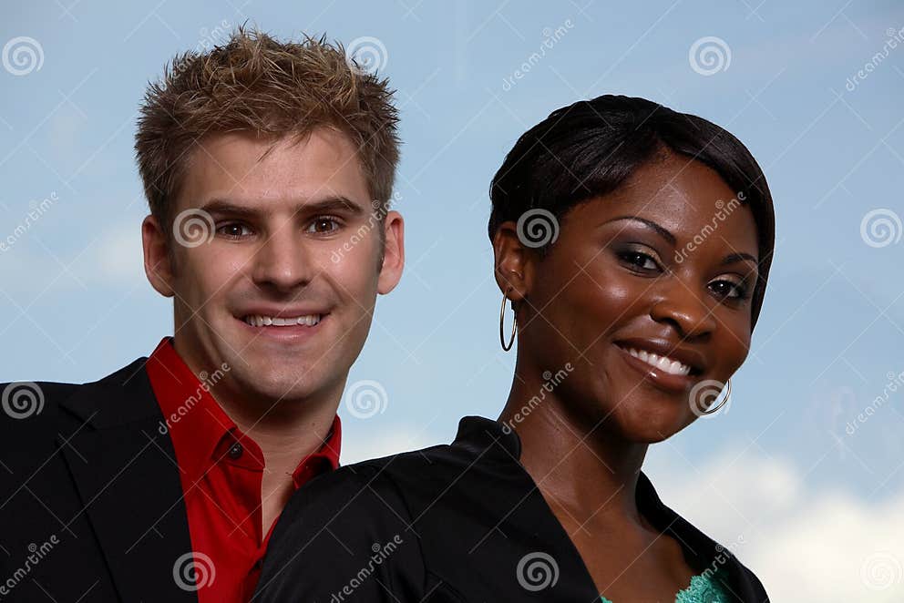 Two team members smiling stock image. Image of business - 2584325