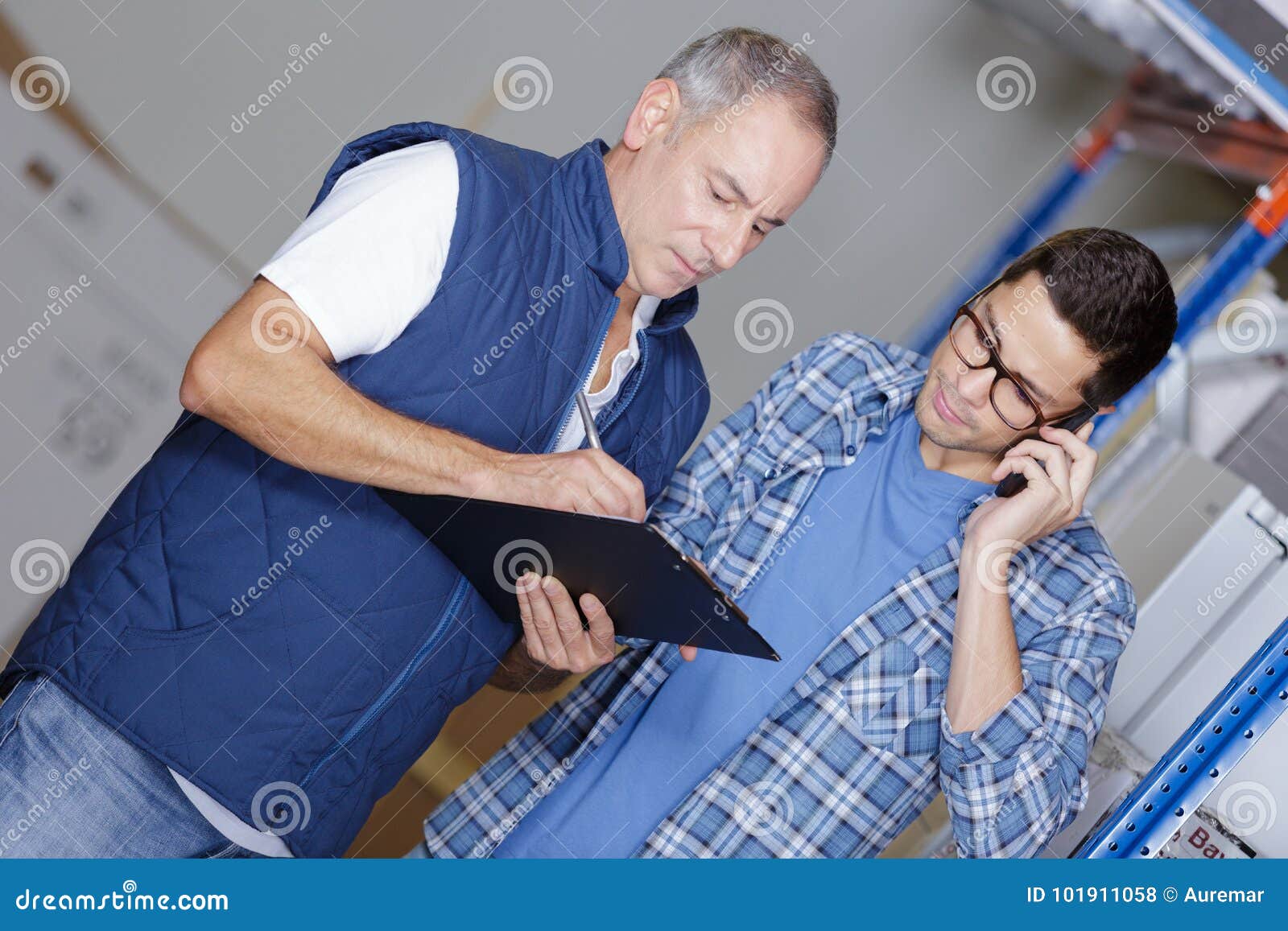 Two Technician in Factory Talking Stock Photo - Image of talking ...
