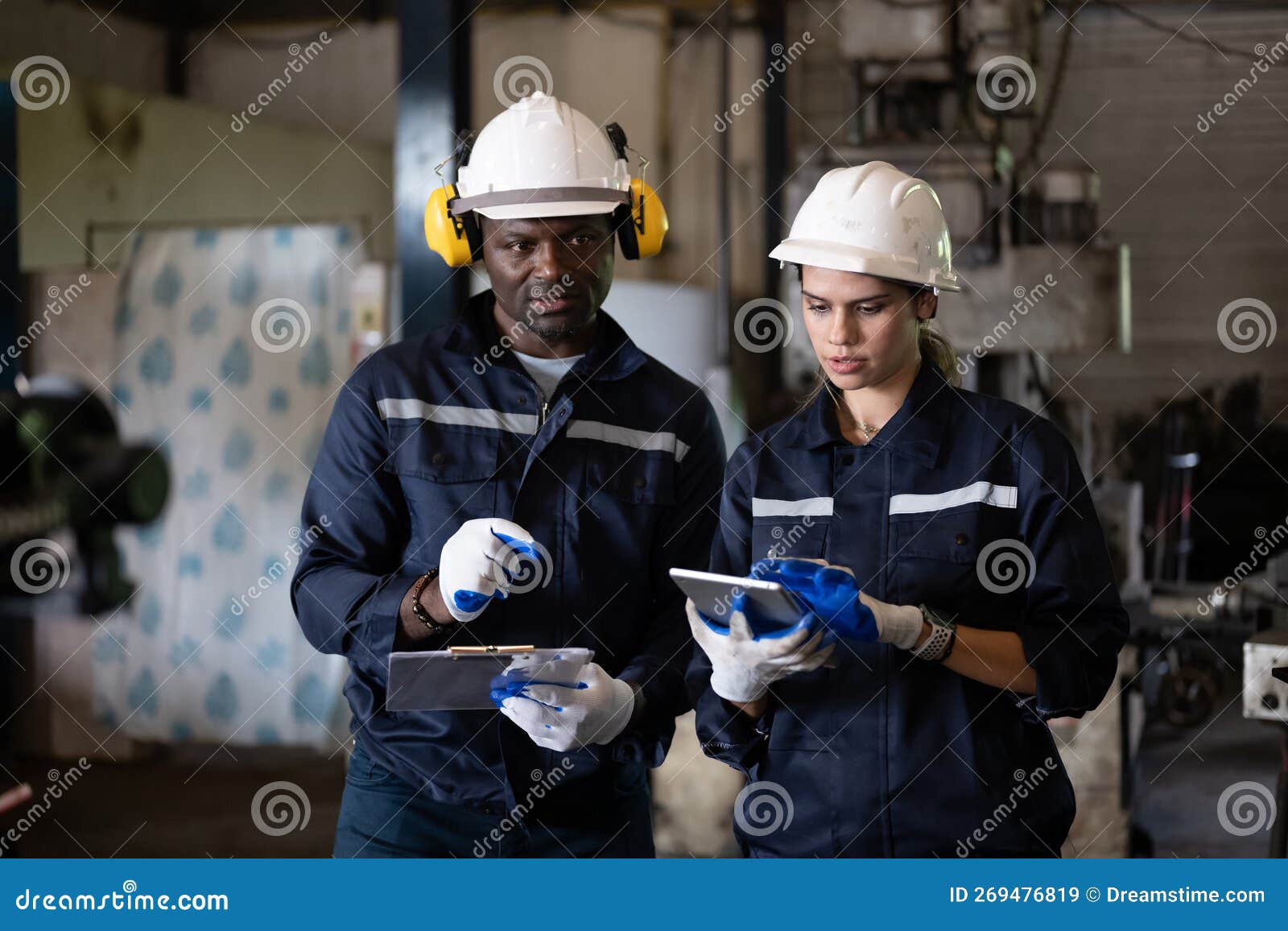 Technicians And Engineers Are Working In A Factory With Modern Machines. Asian Man Mechanical ...