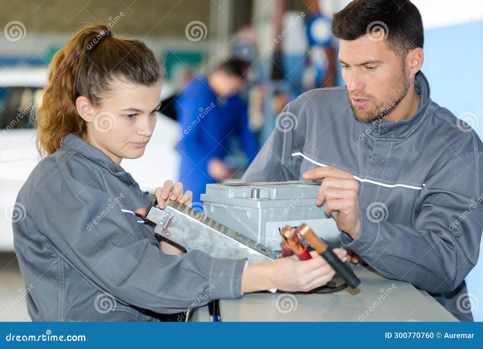 Two Technicians Work on Tool Stock Photo - Image of metal, teamwork ...
