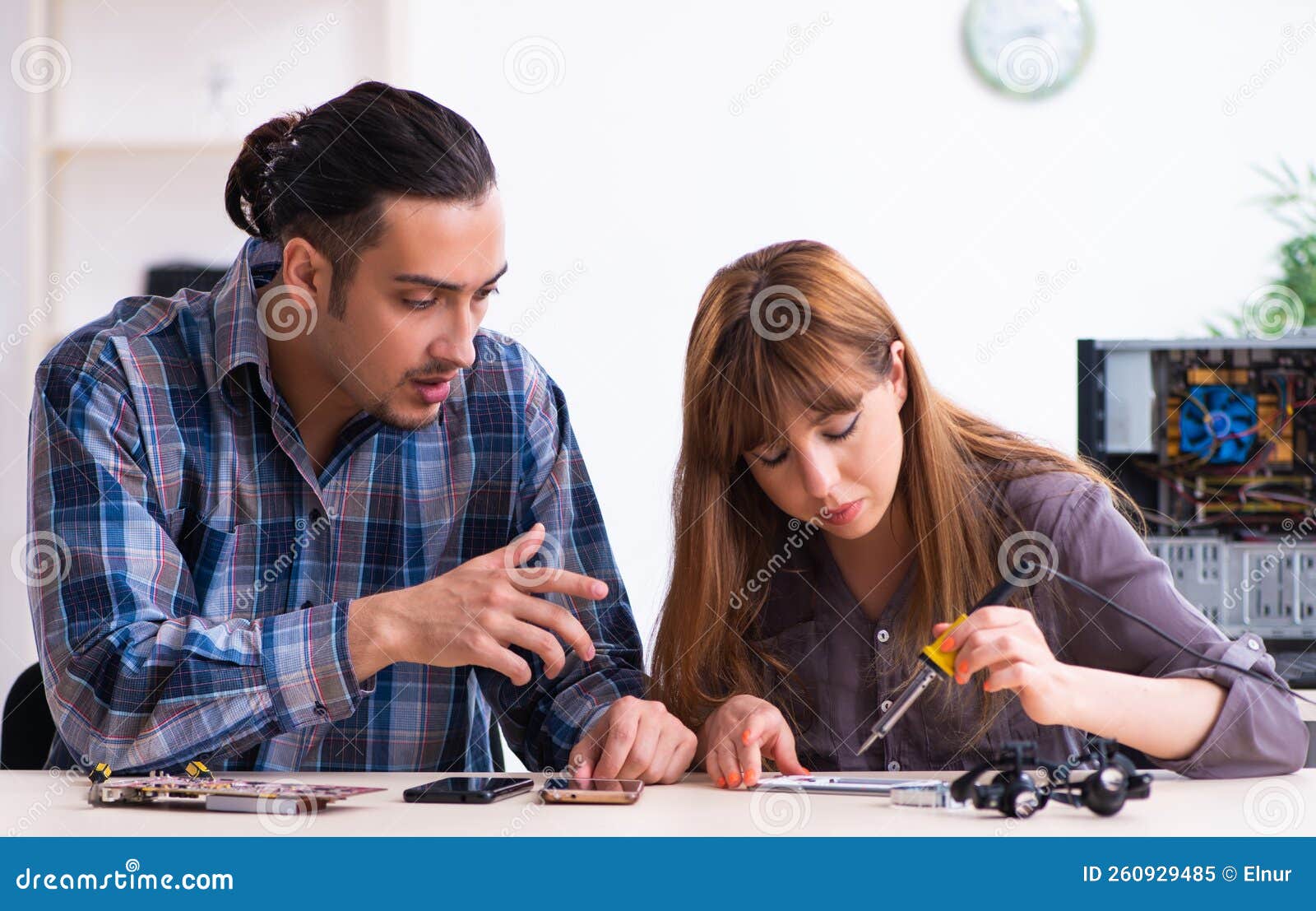 Two Technicians Working at Computer Warranty Center Stock Image - Image ...