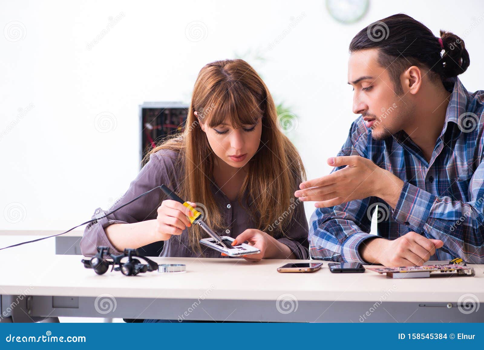 Two Technicians Working at Computer Warranty Center Stock Photo - Image ...