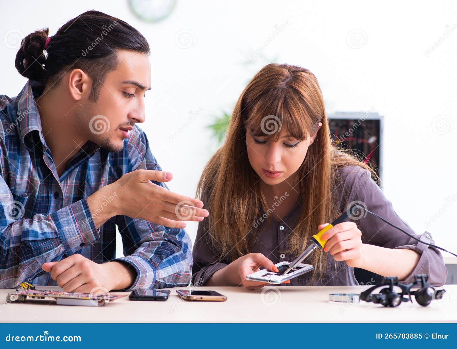 Two Technicians Working at Computer Warranty Center Stock Image - Image ...