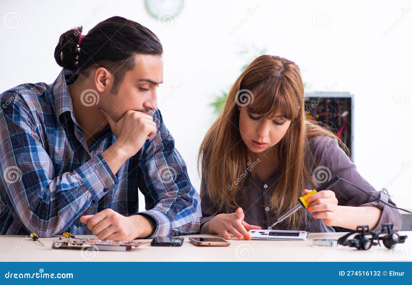 Two Technicians Working at Computer Warranty Center Stock Photo - Image ...