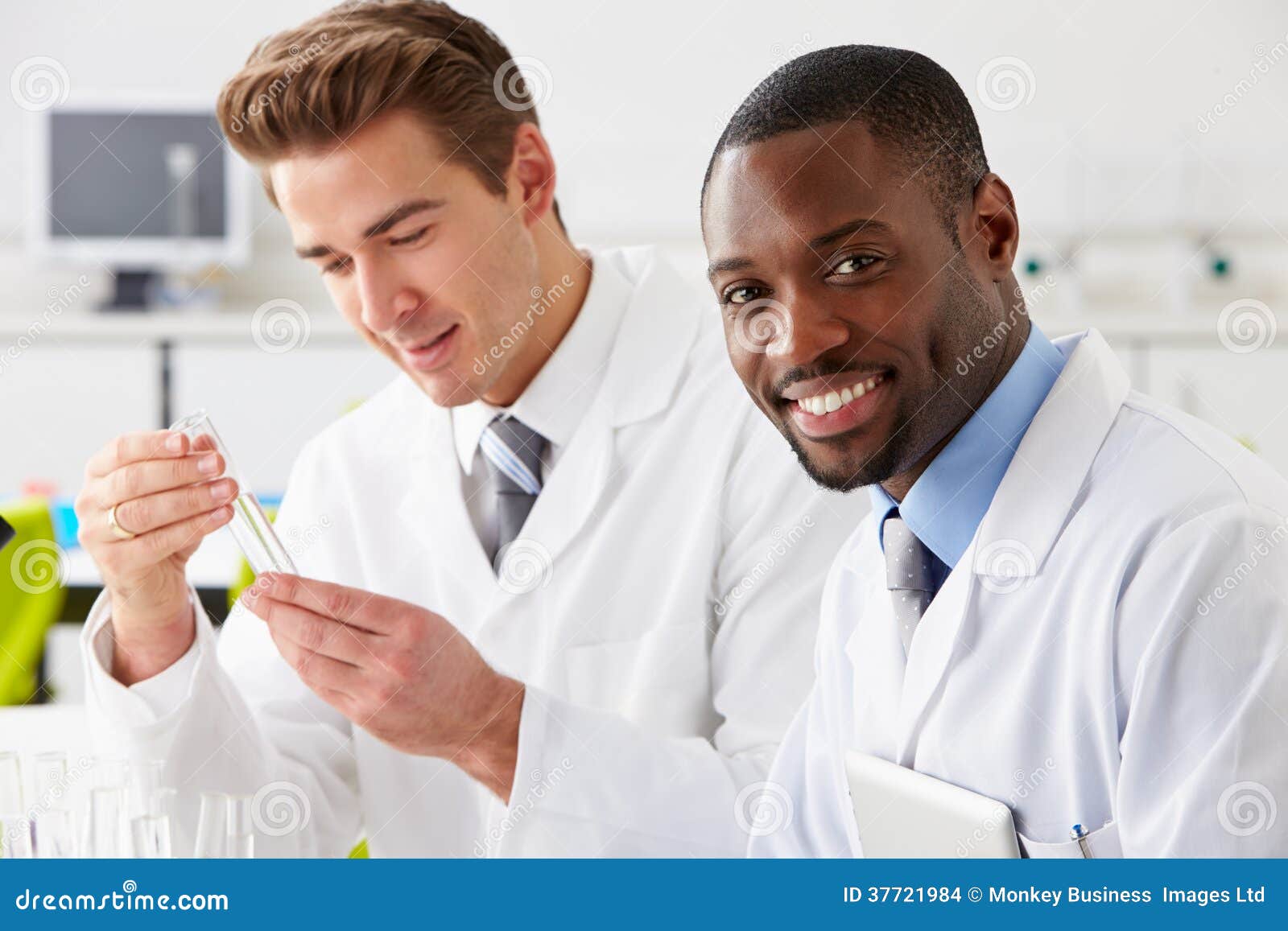 Two Technicians Working in Laboratory Stock Photo - Image of discussion ... Two Technicians Working in Laboratory Stock Photo - Image of discussion ...