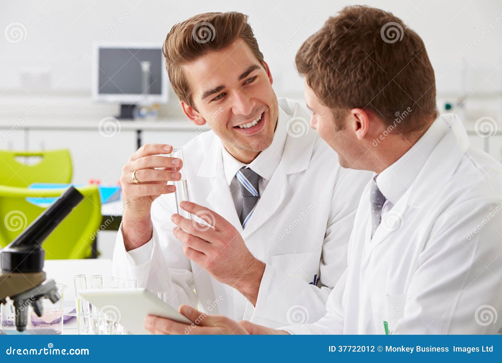 Two Technicians Working in Laboratory Stock Photo - Image of people ...