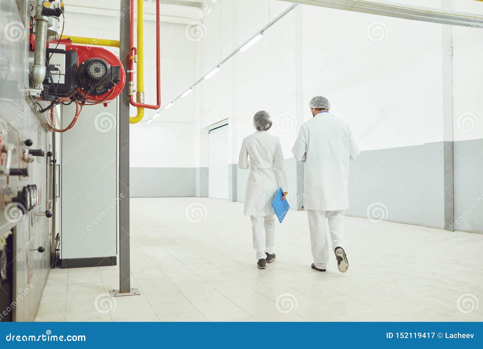 Two Technologists at the Food Factory. Stock Image - Image of producing ...