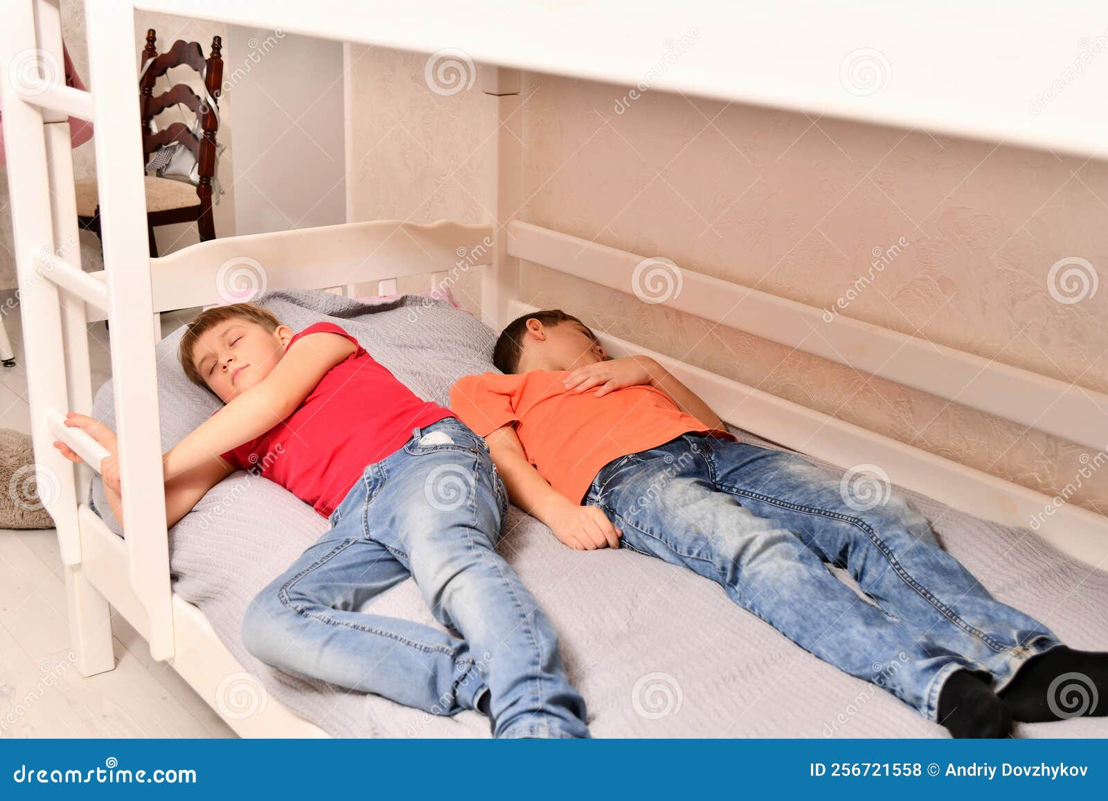 Two Teenage Brothers Were Playing And Fell Asleep Dressed On The Bed