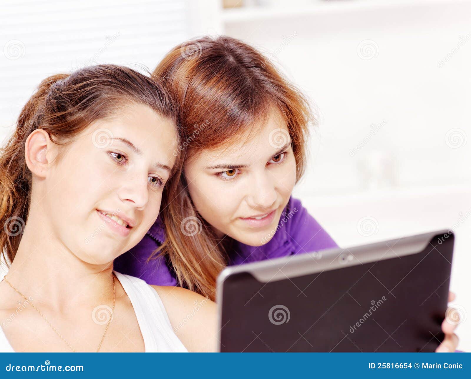 Two Teenage Girls Using Tablet Computer Stock Photo - Image of ...