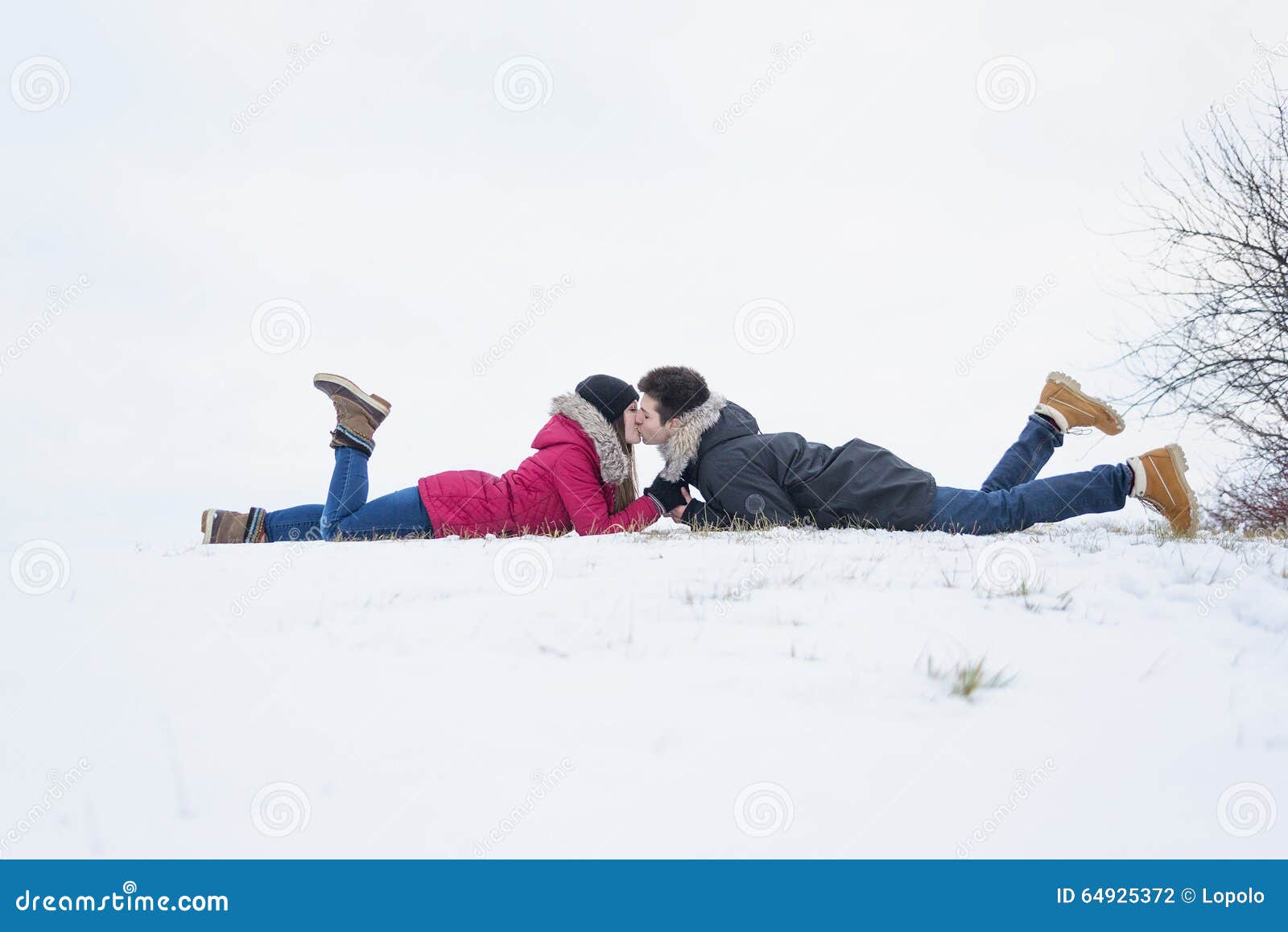 Two Teenagers Havinf Fun on the Snow Field Stock Photo - Image of ...