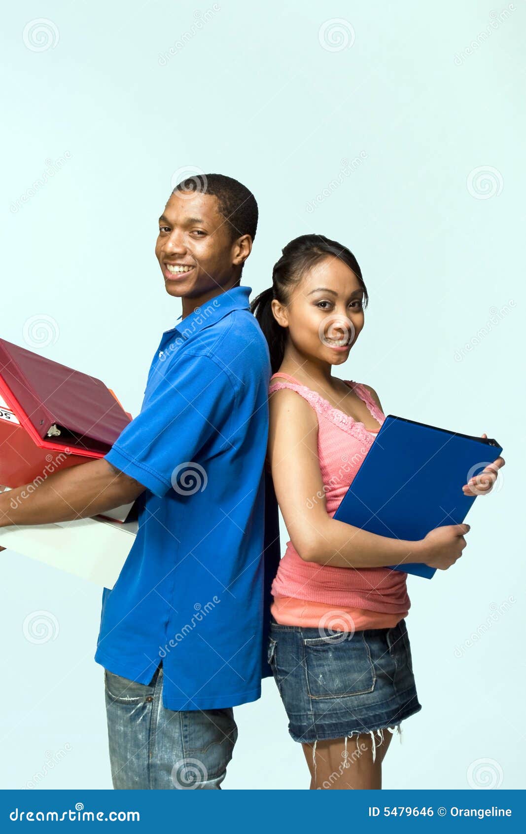 Two Teens Stand Back To Back - Vertical Stock Photo - Image of laughter ...