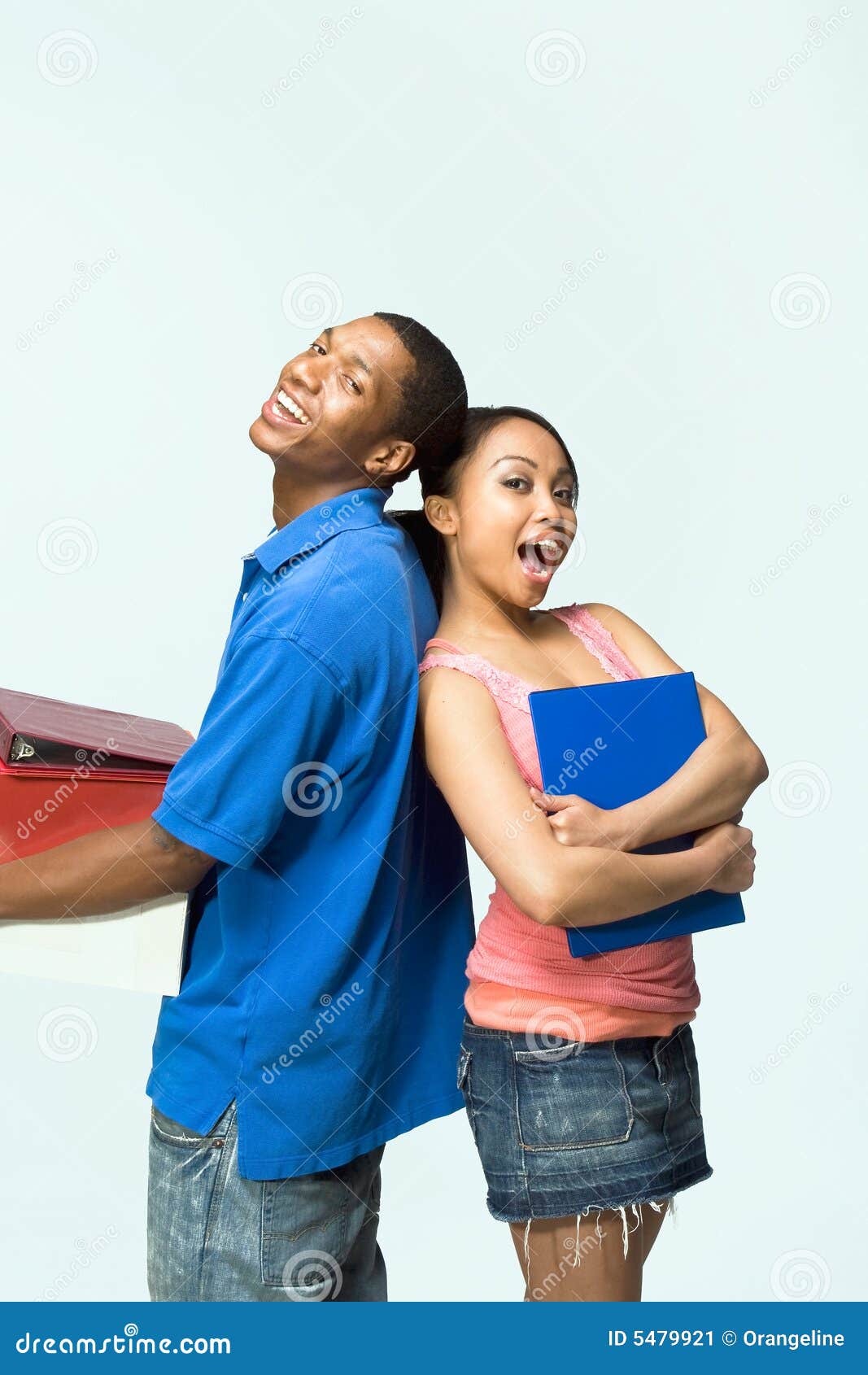Two Teens Stand Back To Back - Vertical Stock Image - Image of male ...
