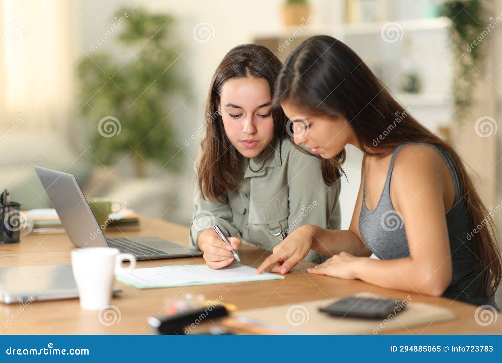 Two Tele Workers Reading and Signing Contract Stock Image - Image of ...