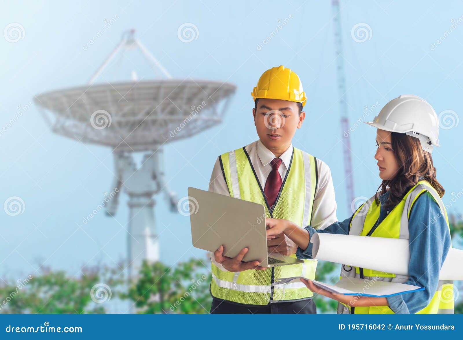 Telecommunication Engineer Male and Female is Discussing on Document ...