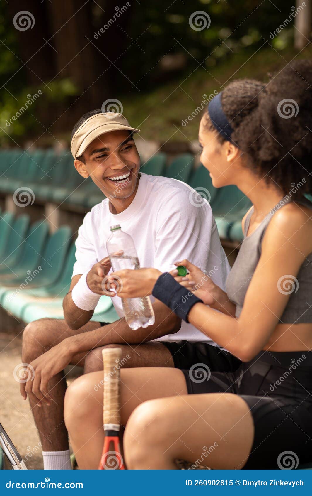 Two Tennis Players Resting after the Game and Looking Contented Stock ...
