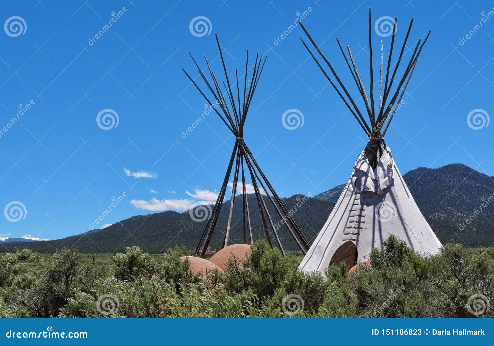 Tepees in the landscape stock image. Image of nature - 151106823