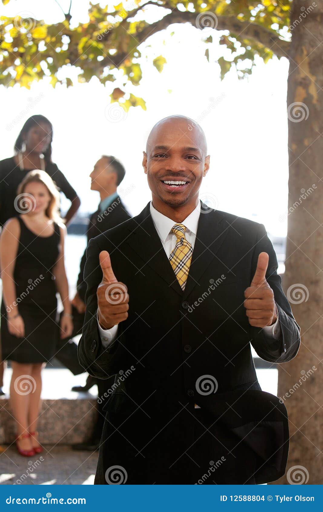 Two Thumbs Up stock photo. Image of american, coworkers - 12588804