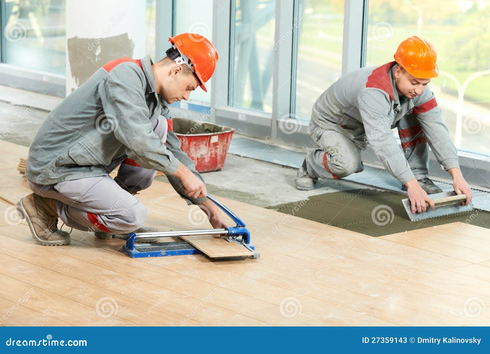 Two Tilers at Industrial Floor Tiling Renovation Stock Image - Image of ...