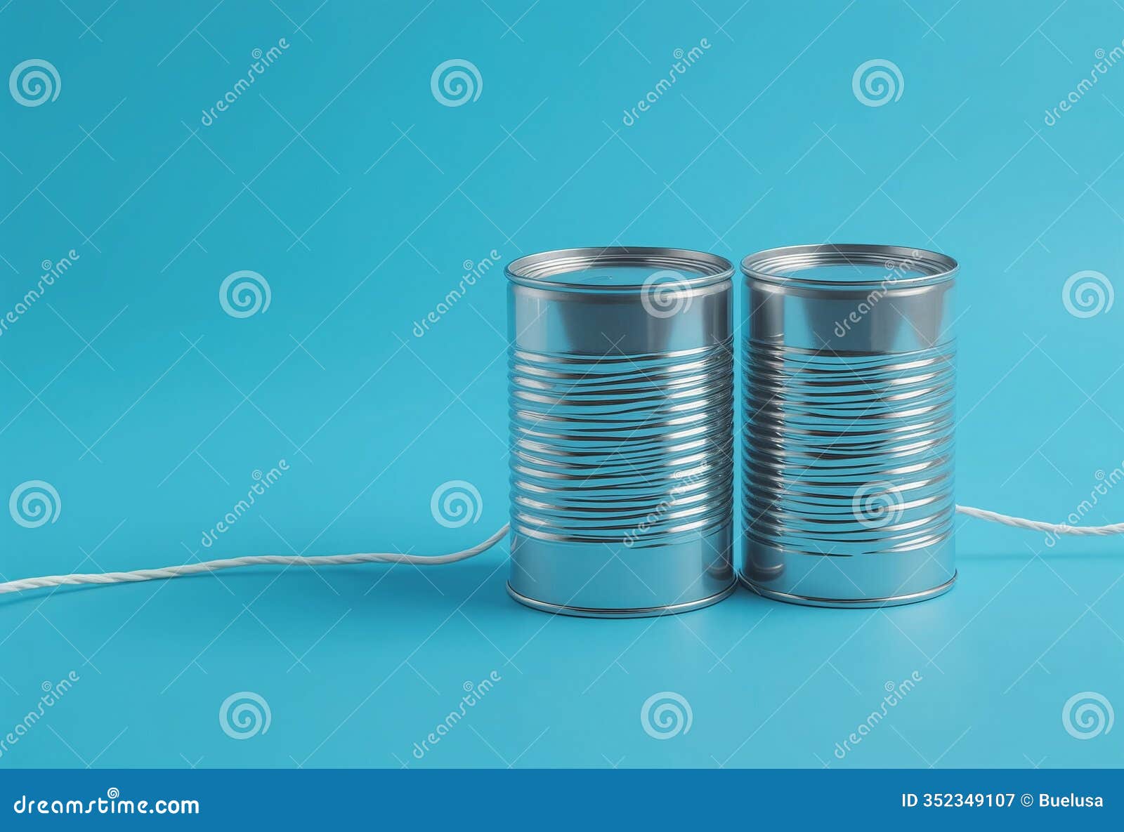 Two Tin Cans Connected by a String on a Blue Background Symbolize ...