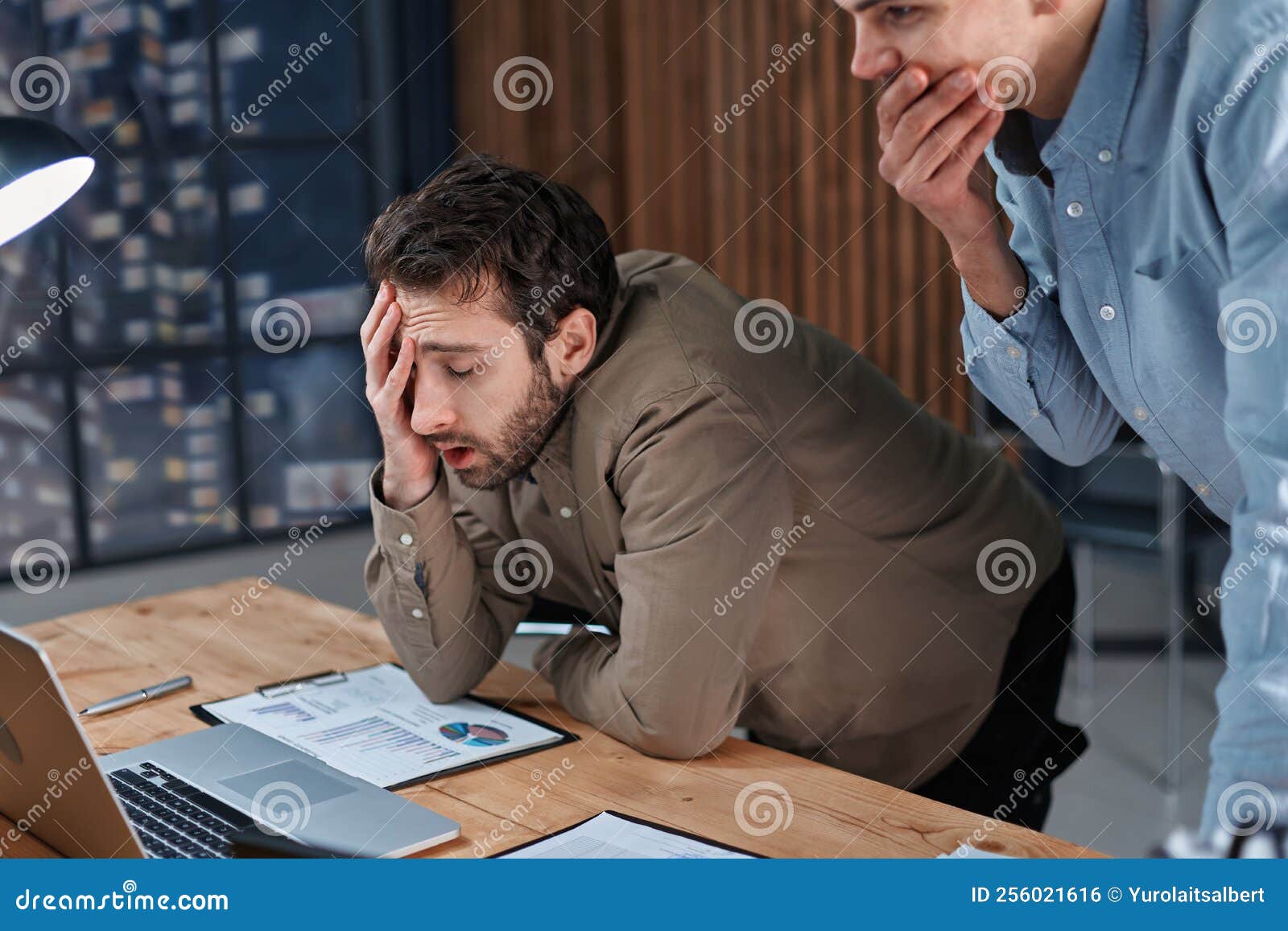 Two Tired Employees Working with Financial Documents until Late at ...