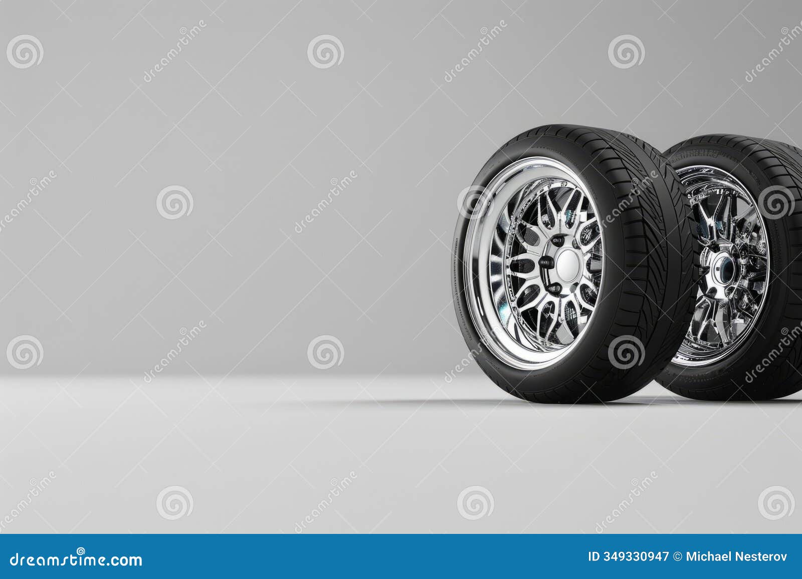 Two Tires with Alloy Wheels Standing on a Gray Background Stock Image ...